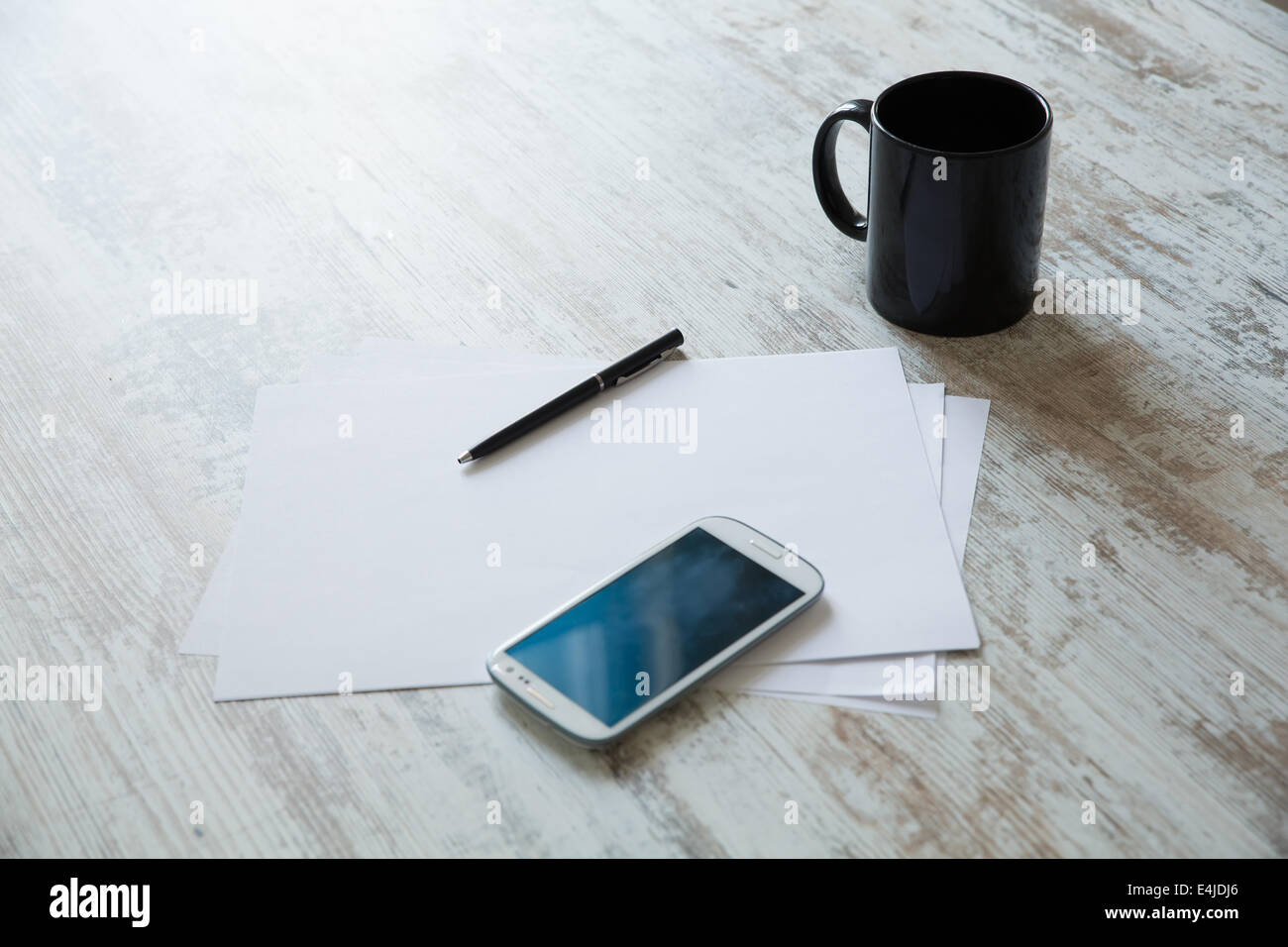 Brainstorming and taking notes at the table Stock Photo - Alamy