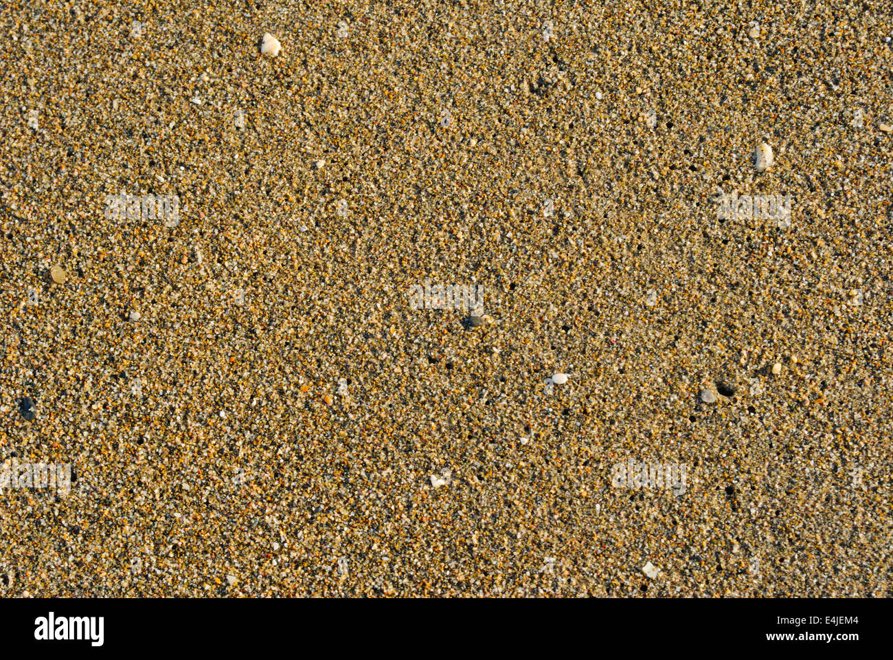 Texture of dark beach sand Stock Photo - Alamy