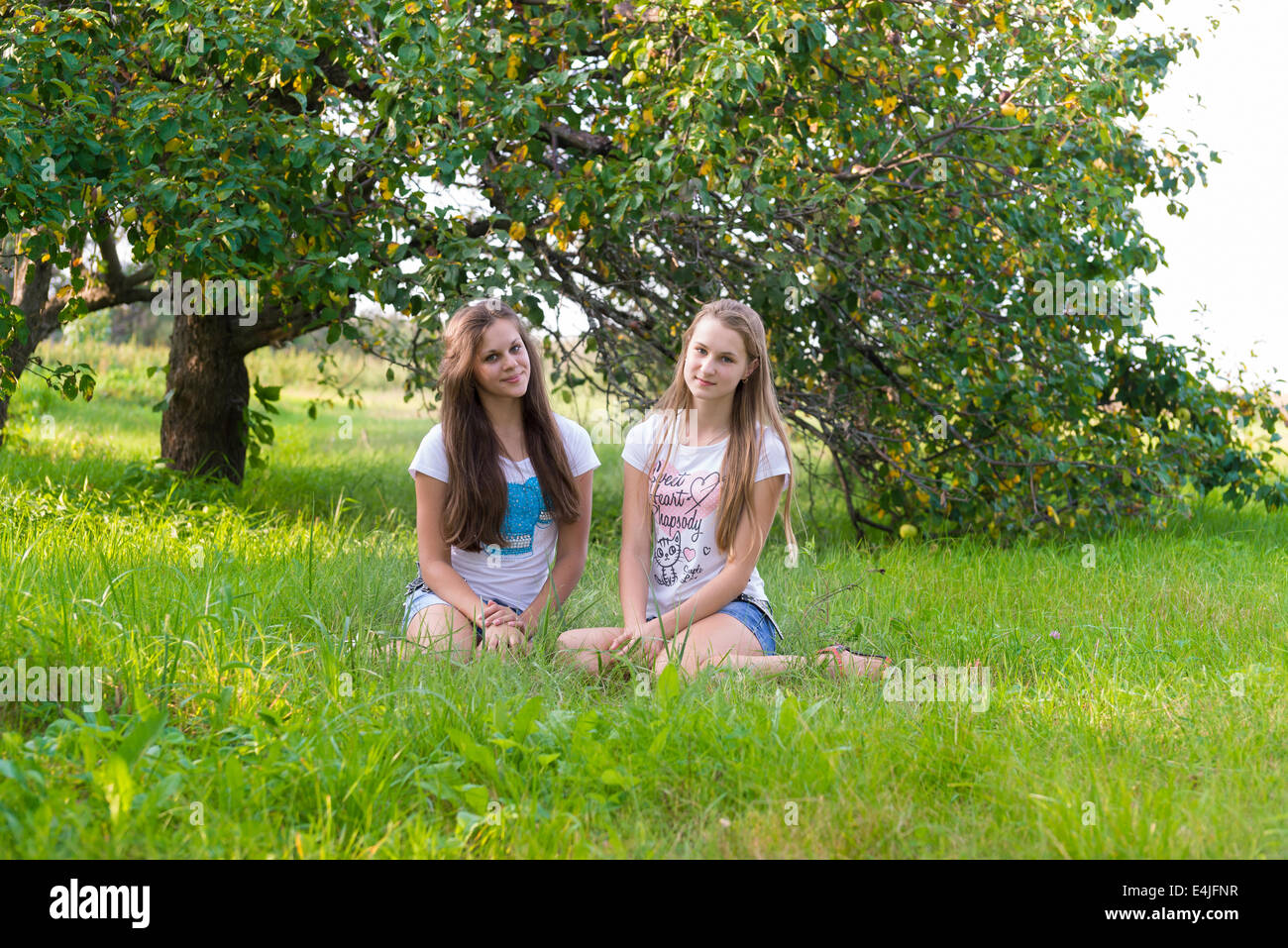 Two teen girls in the park Stock Photo - Alamy