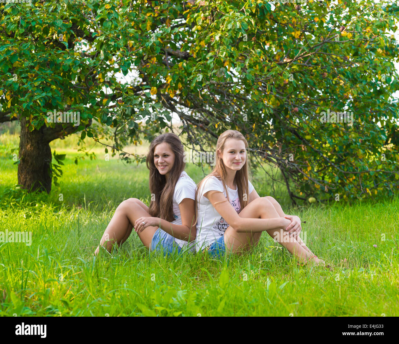 Two teen girls in the park Stock Photo - Alamy