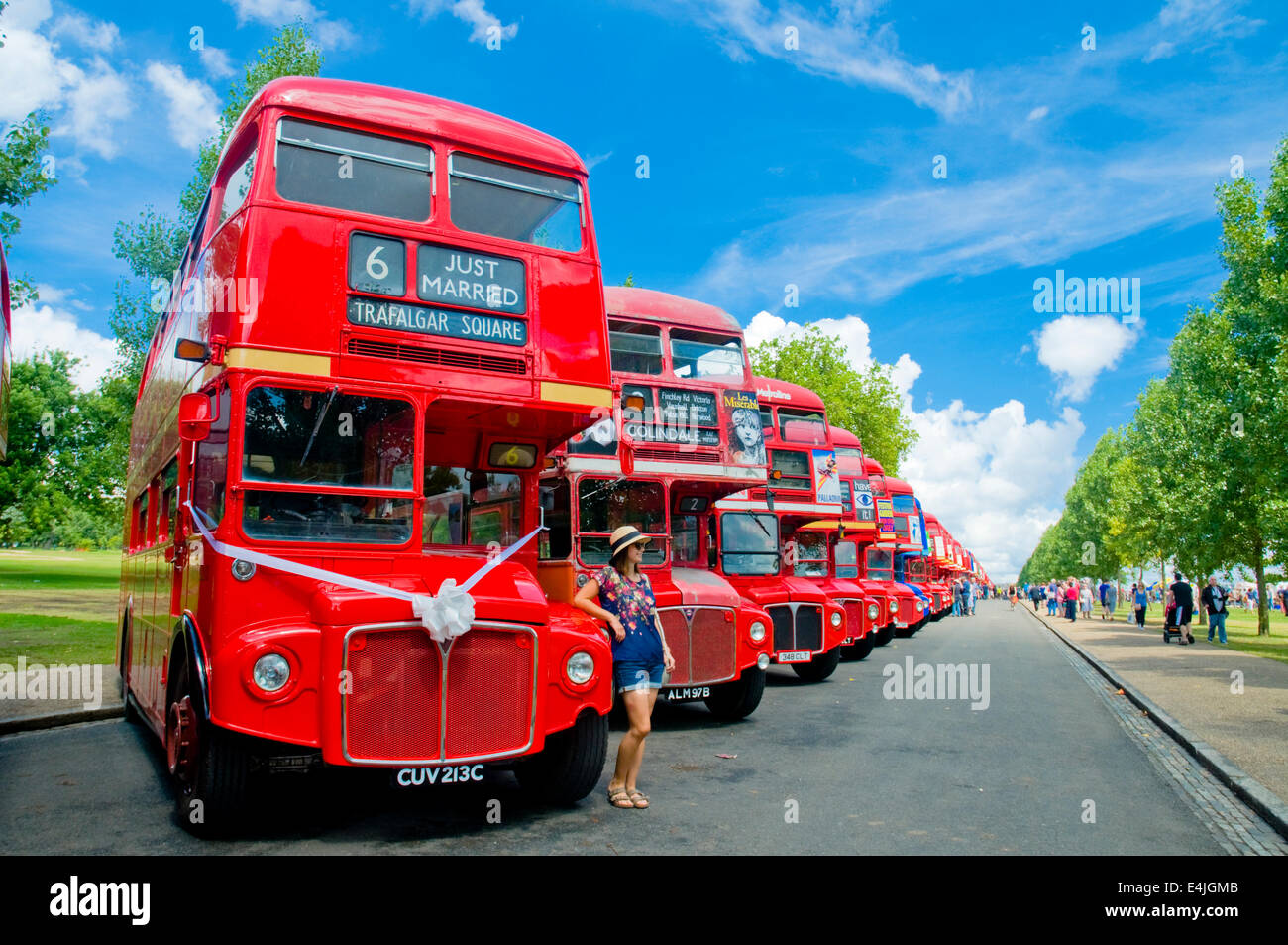A young woman poses by a red routemaster at the Routemaster Bus ...