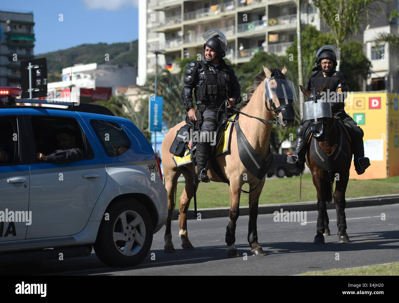 Rio de Janeiro, Brazil. 13th July, 2014. Mounted police provide ...
