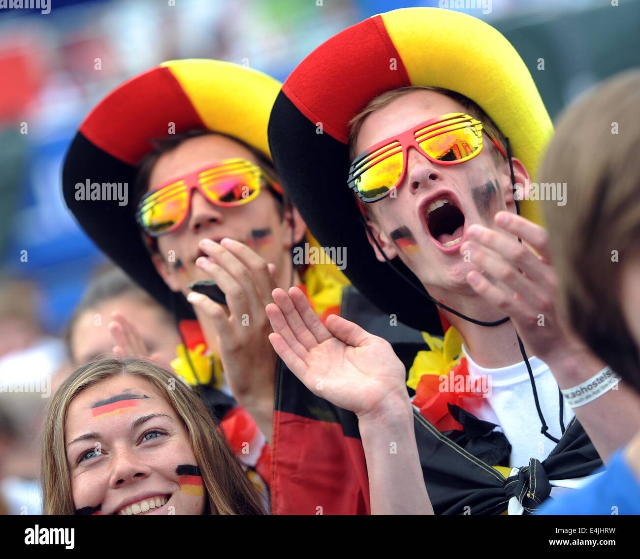 Berlin, Germany. 13th July, 2014. Fans celebrate before the World Cup ...