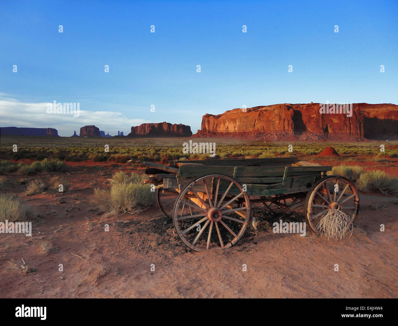 Wooden cart set against Monument Valley, USA Stock Photo - Alamy