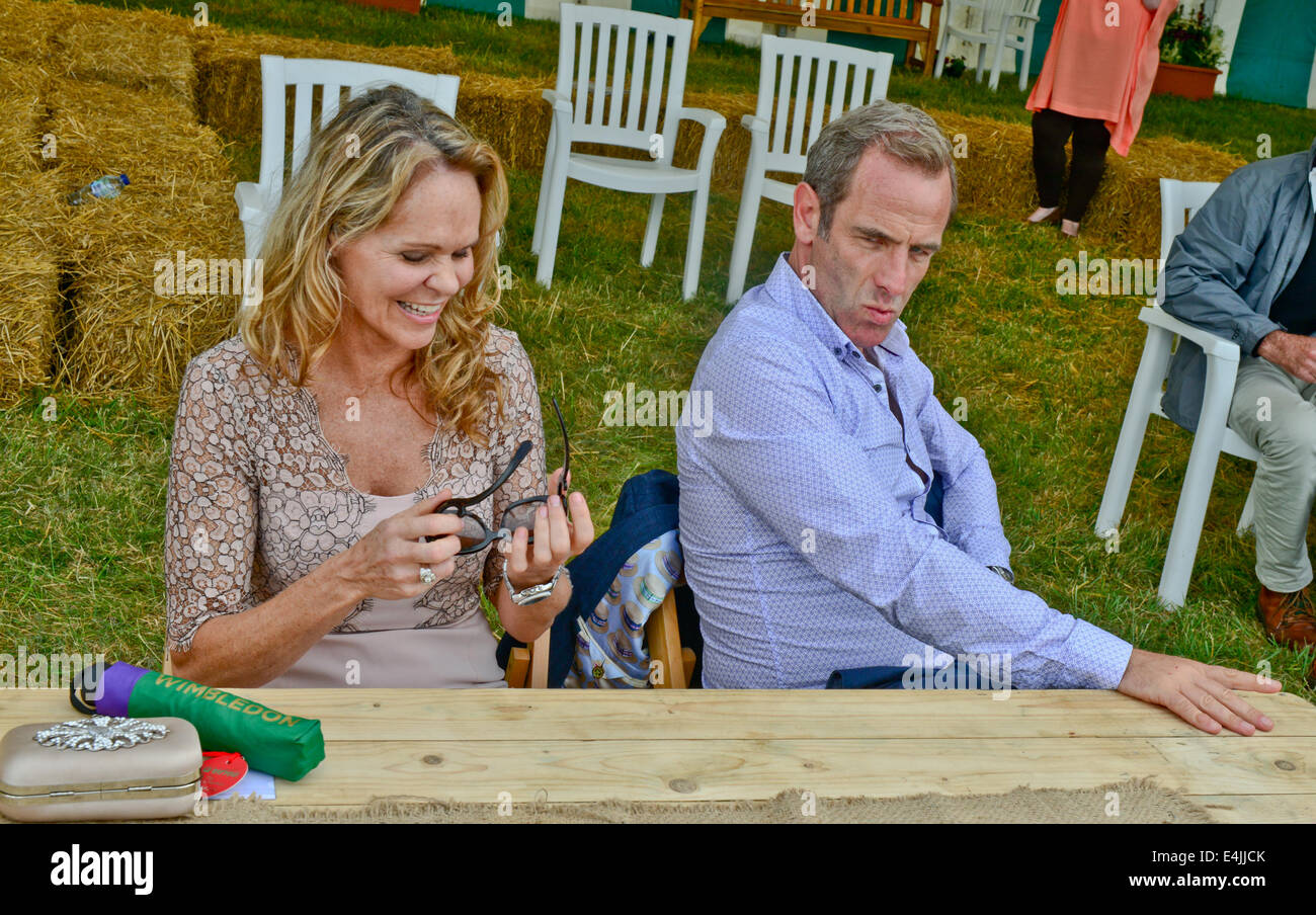 Fairford, UK. 13th July, 2014. Robson Green and Partner at the ...
