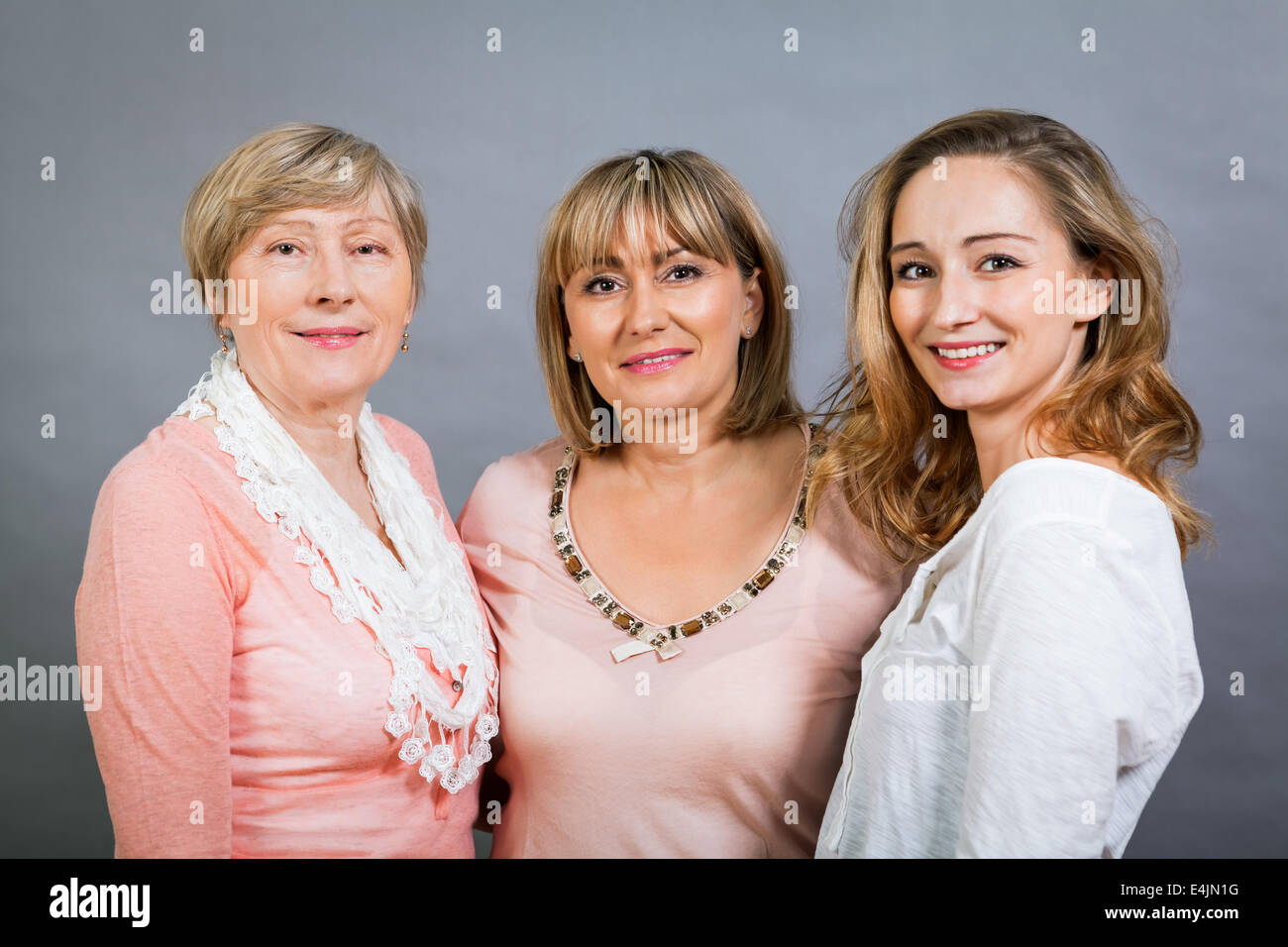 Three generations of attractive women with blond hair and a striking ...