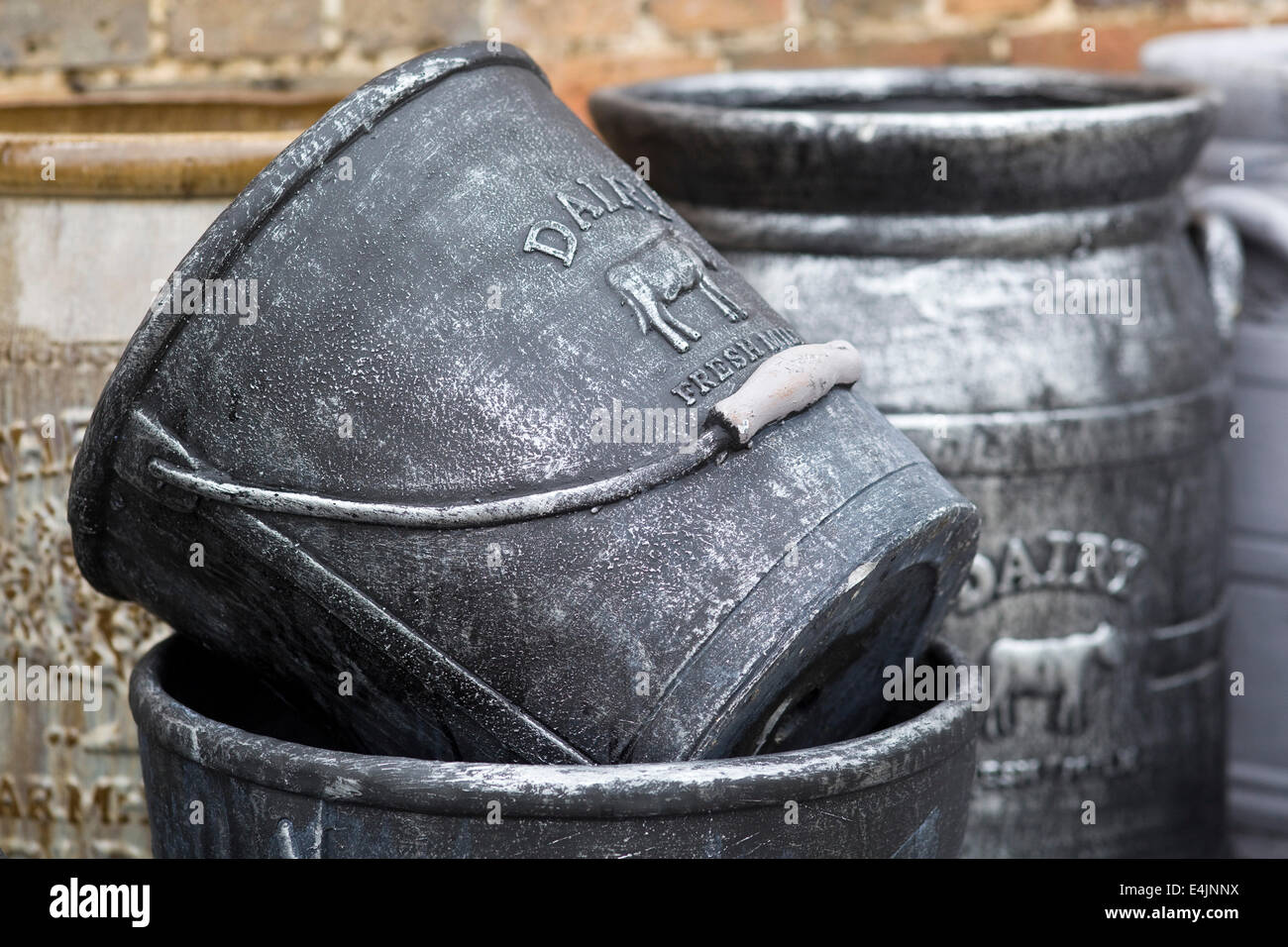 Ornamental decorative Milk Pail Flower pots Stock Photo - Alamy