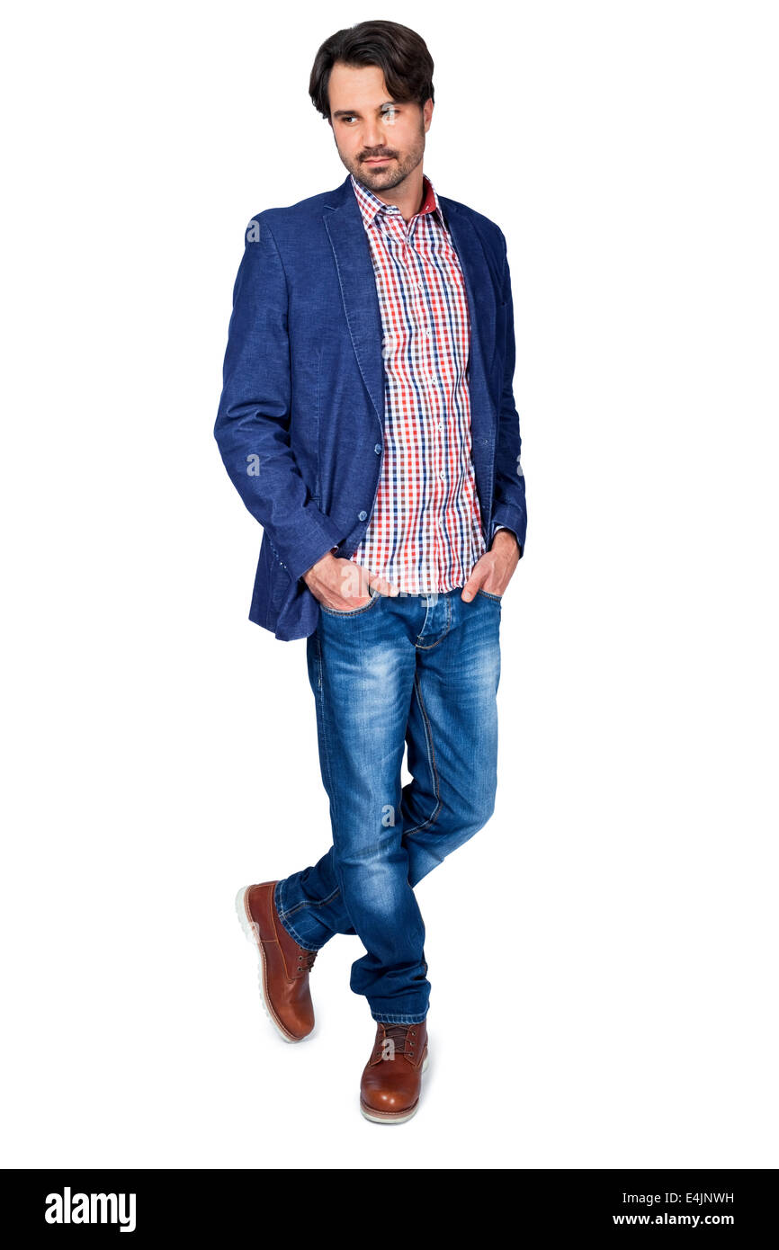 Handsome smiling man in stylish leisurewear approaching the camera in a ...