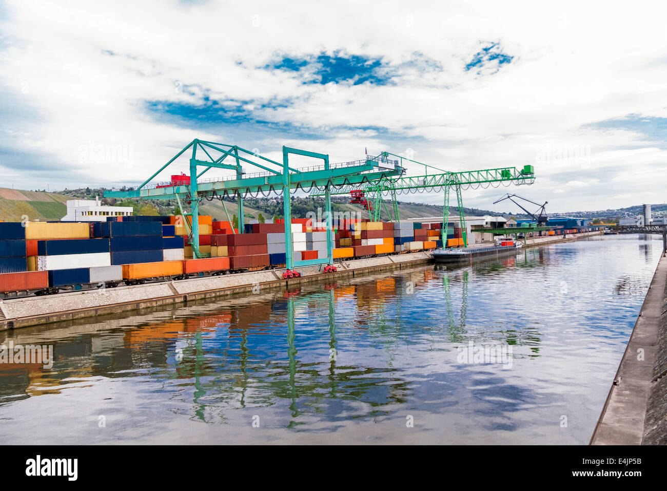 Shipyard with stacked cargo containers and cranes Stock Photo - Alamy