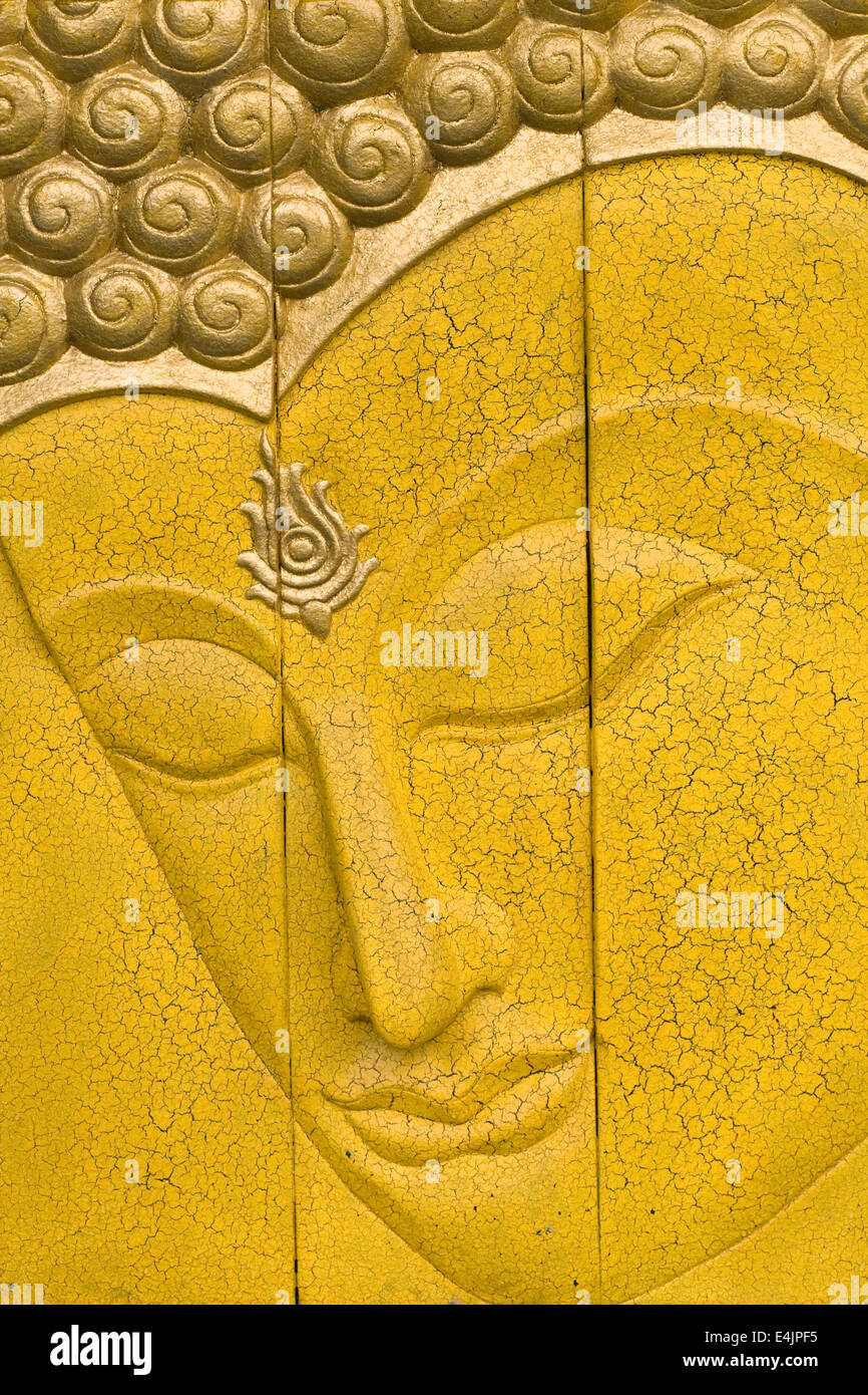 Wooden Buddha Yellow and Golden Stock Photo - Alamy