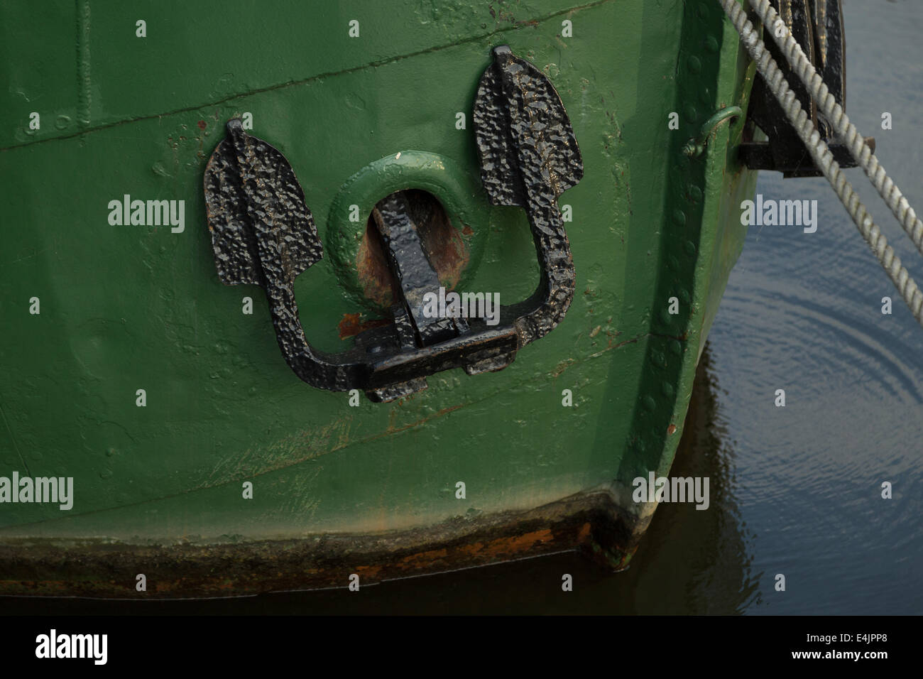 A close up photograph of a baot docked in Hamburg harbor. The Port of ...