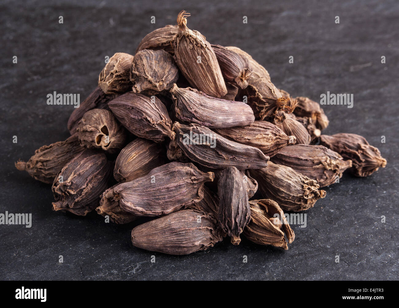 Black cardamon pods hi-res stock photography and images - Alamy