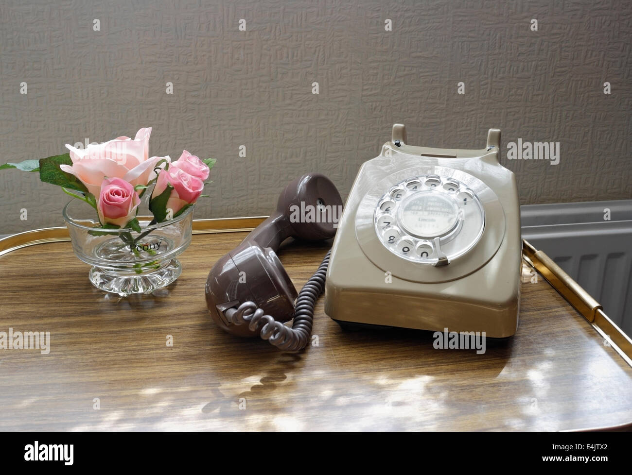 Old style classic rotary dial telephone, plastic roses peony Stock ...