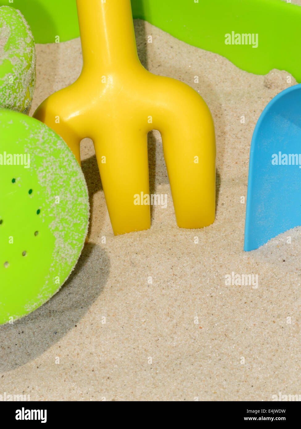 An image showing the concept of summer fun in the sand with a fork in ...