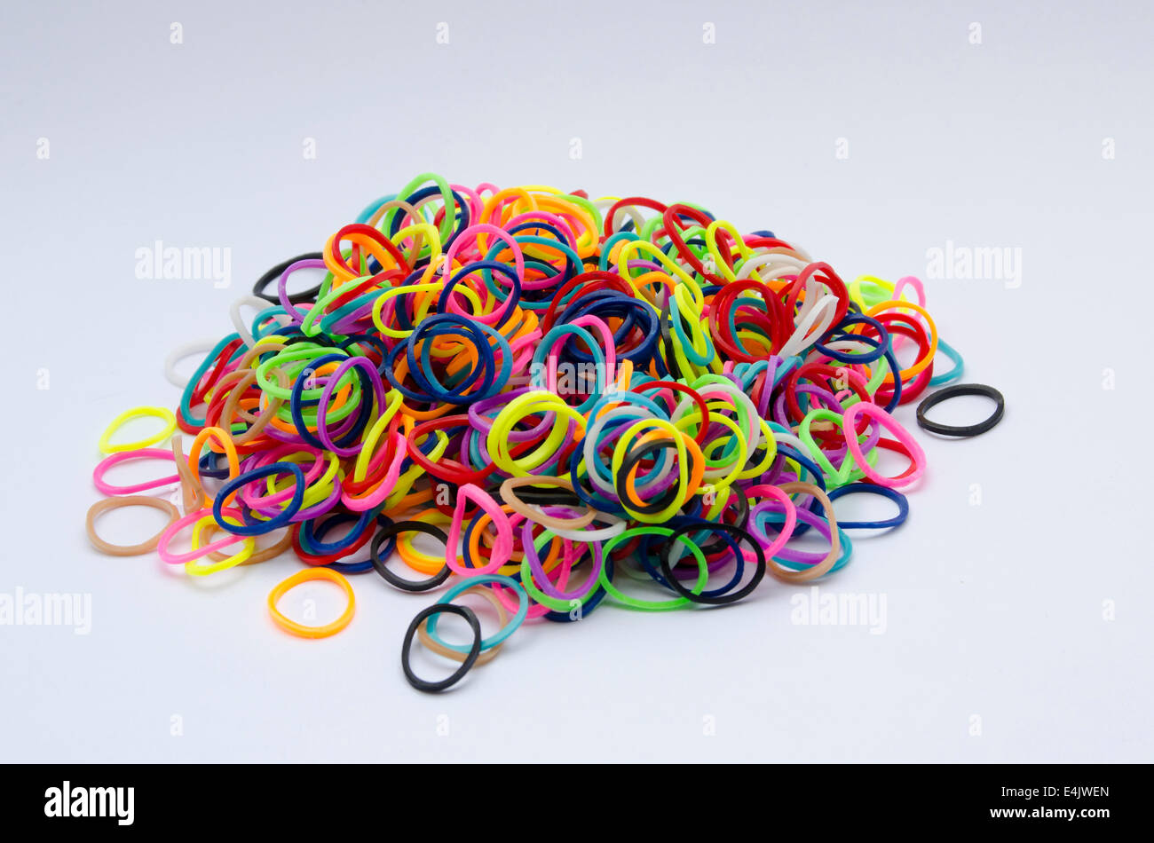 Loom bands on white background Stock Photo - Alamy