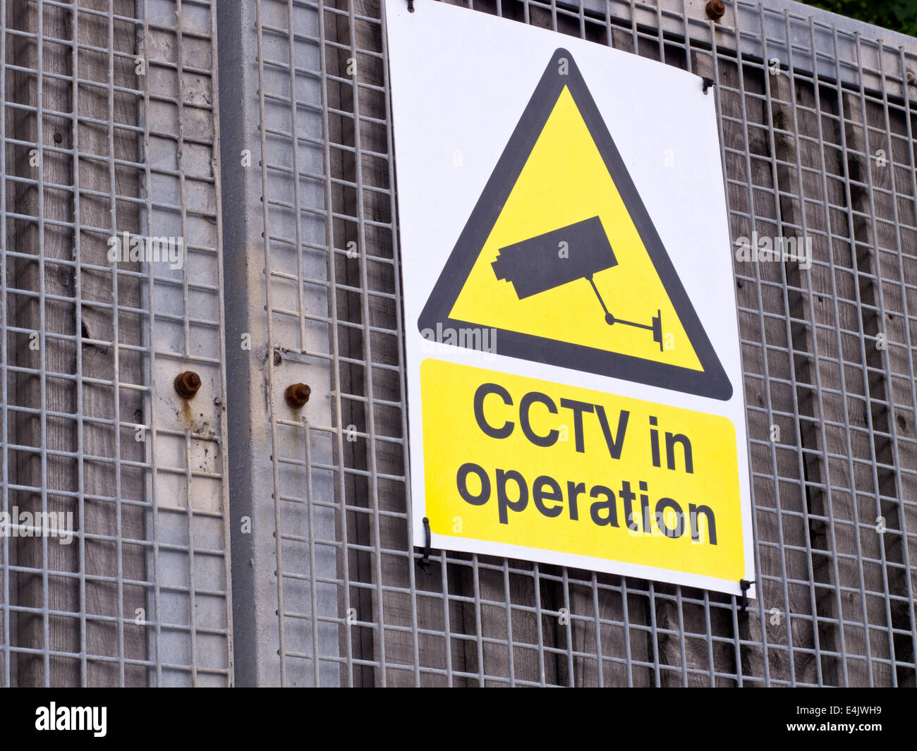 A sign showing CCTV in operation in the area Stock Photo - Alamy