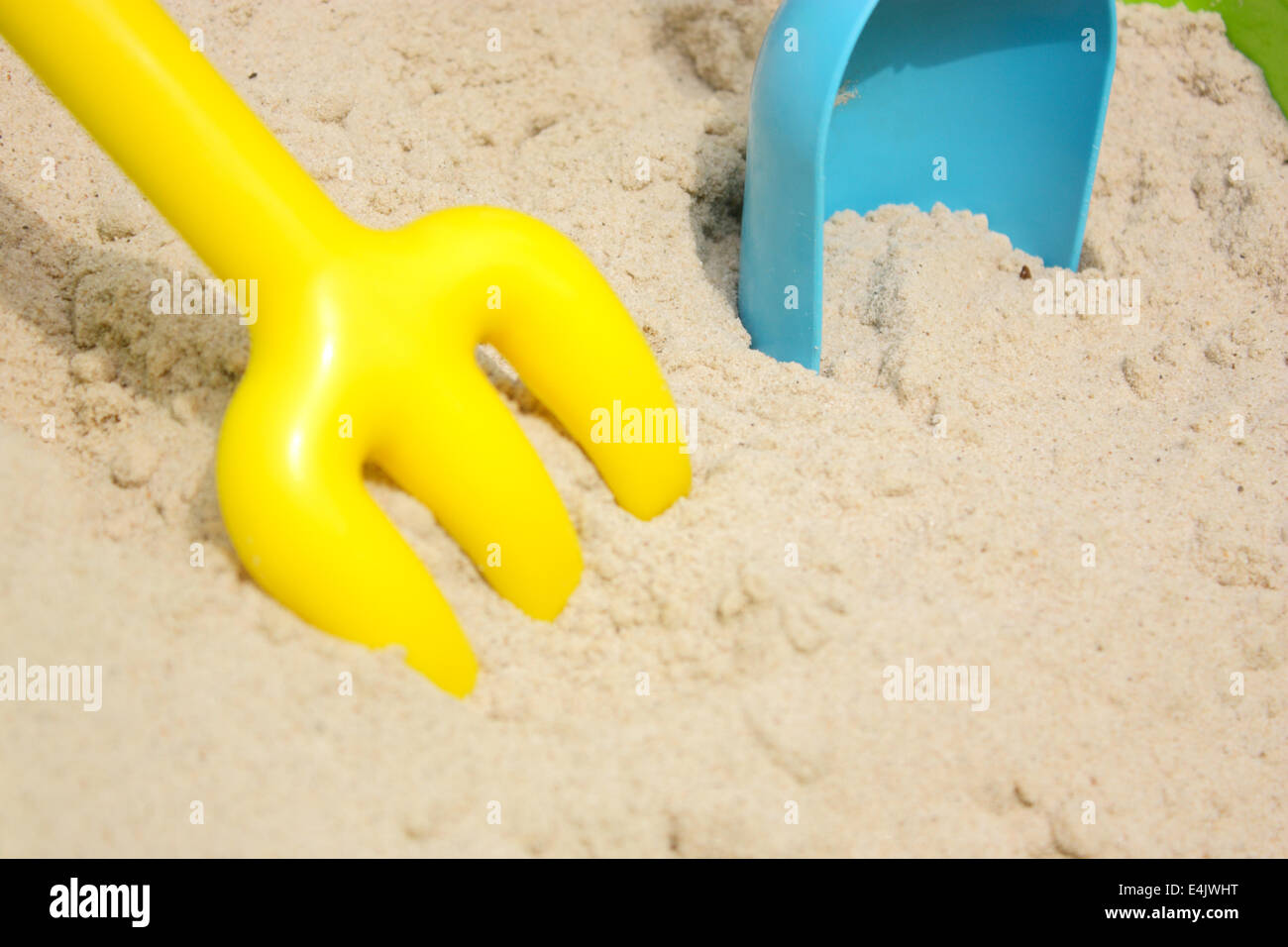 An image showing the concept of summer fun in the sand with a spade and ...