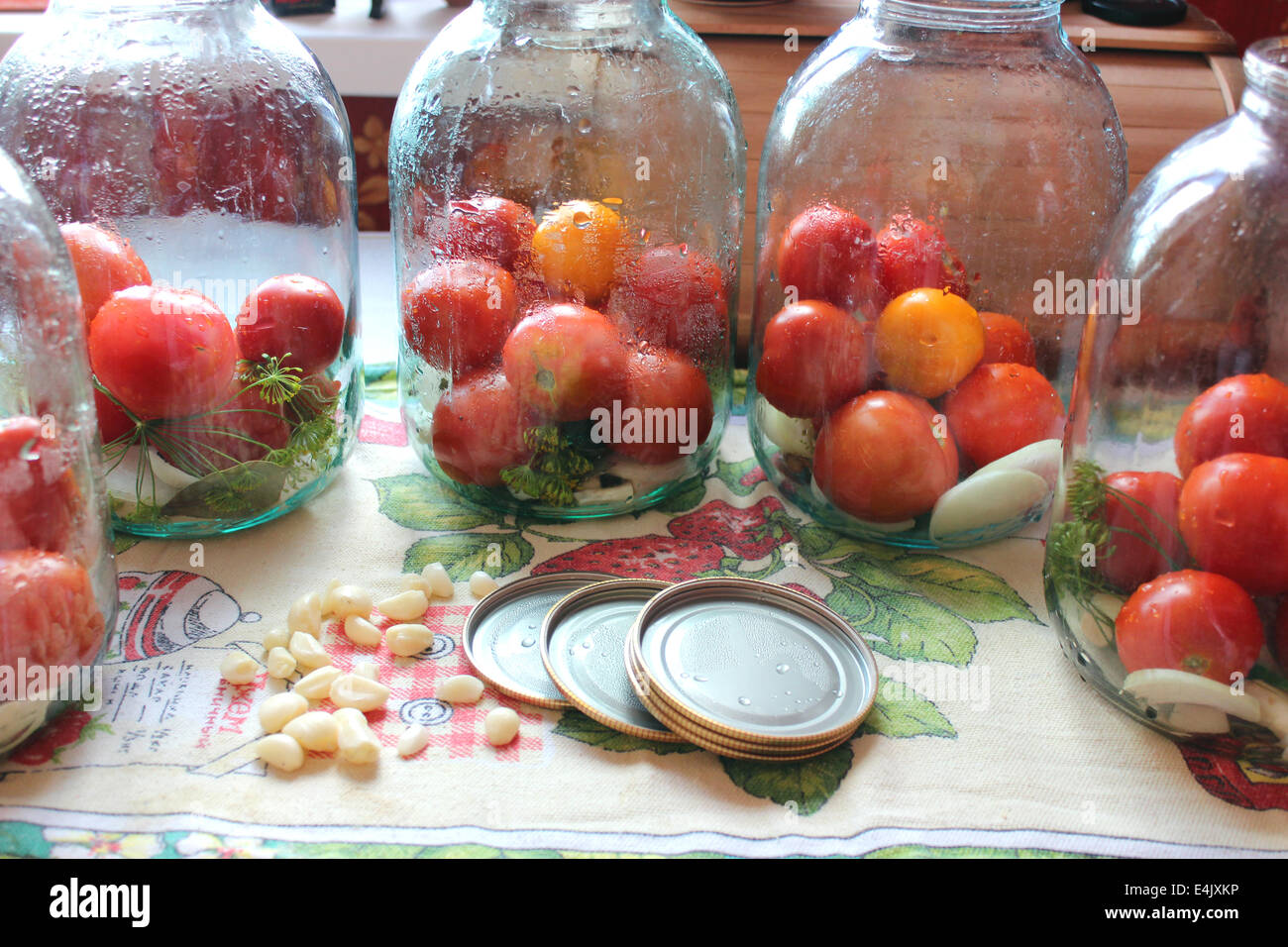 image of tomato in jars prepared for preservation Stock Photo - Alamy