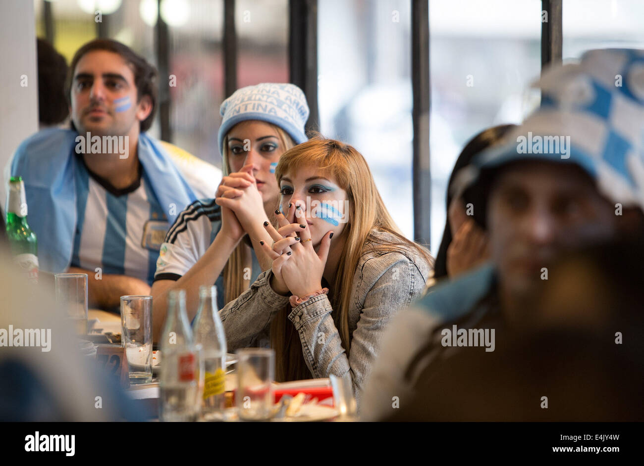 Buenos Aires, Argentina. 13th July, 2014. Argentina's fans react while watching the final match ...