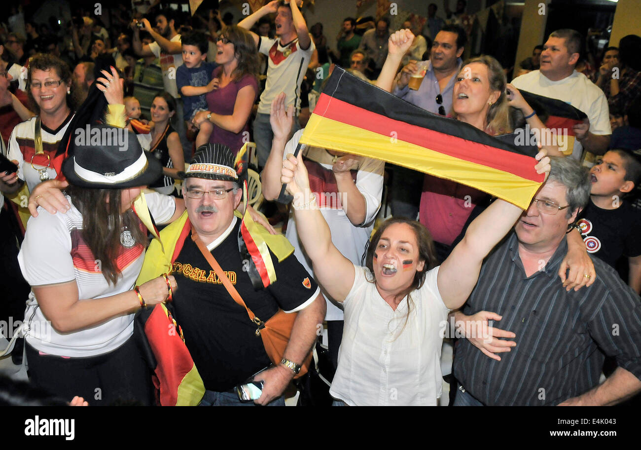 Asuncion, Paraguay. 13th July, 2014. German fans react while watching ...