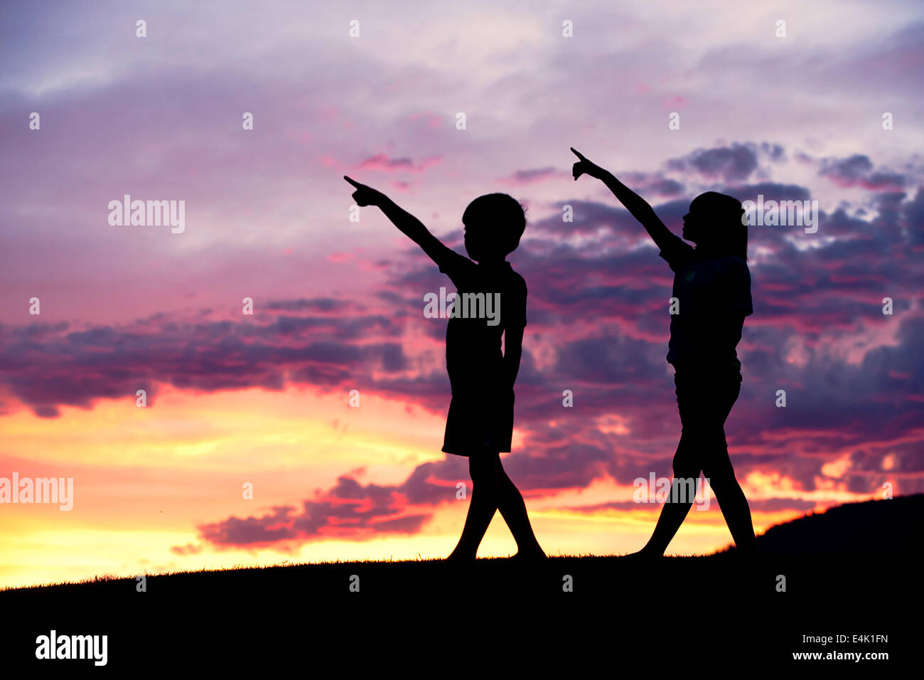 Children pointing at sky hi-res stock photography and images - Alamy