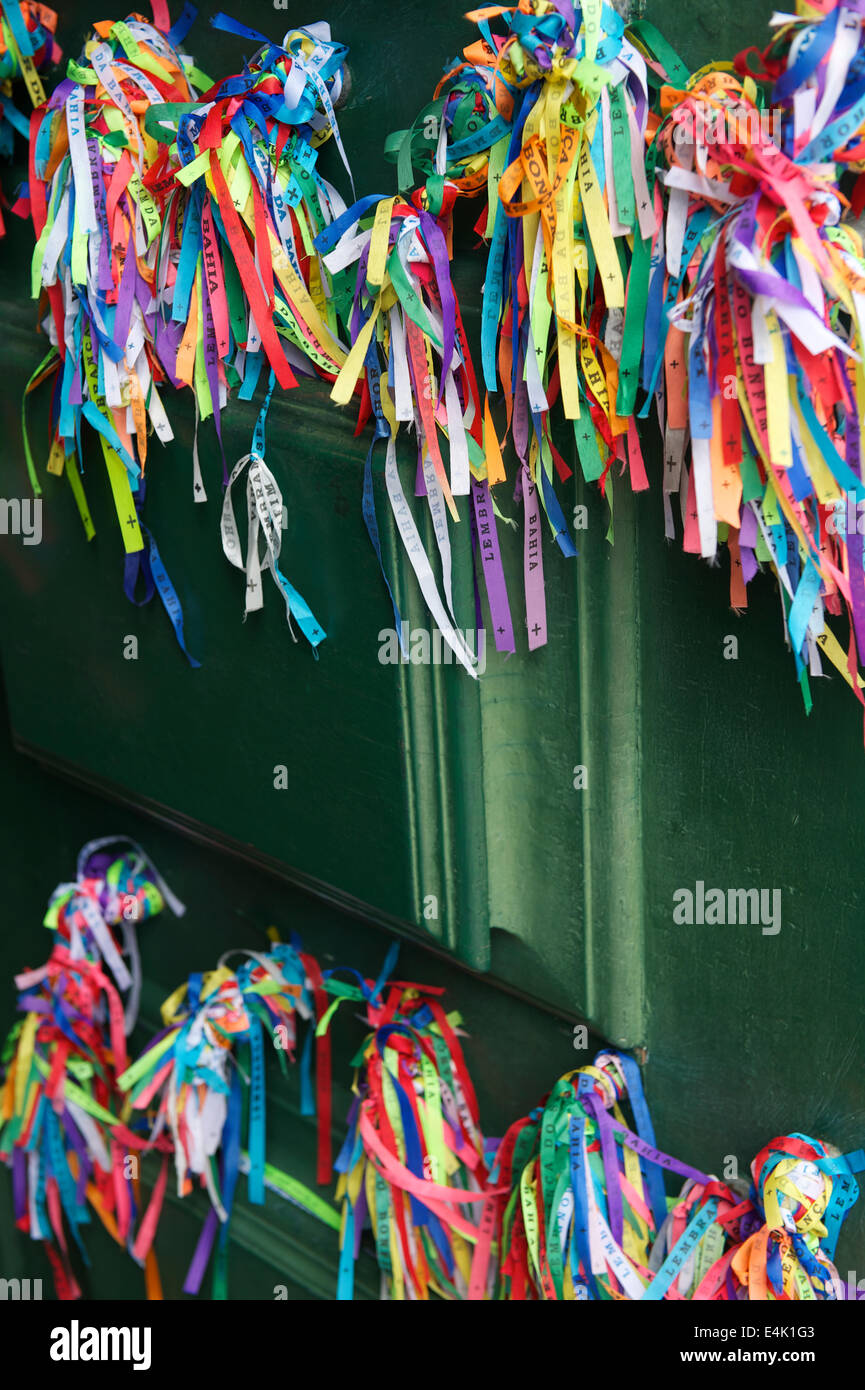 Colorful Brazilian wish ribbons decorate a green door at the Bonfim ...