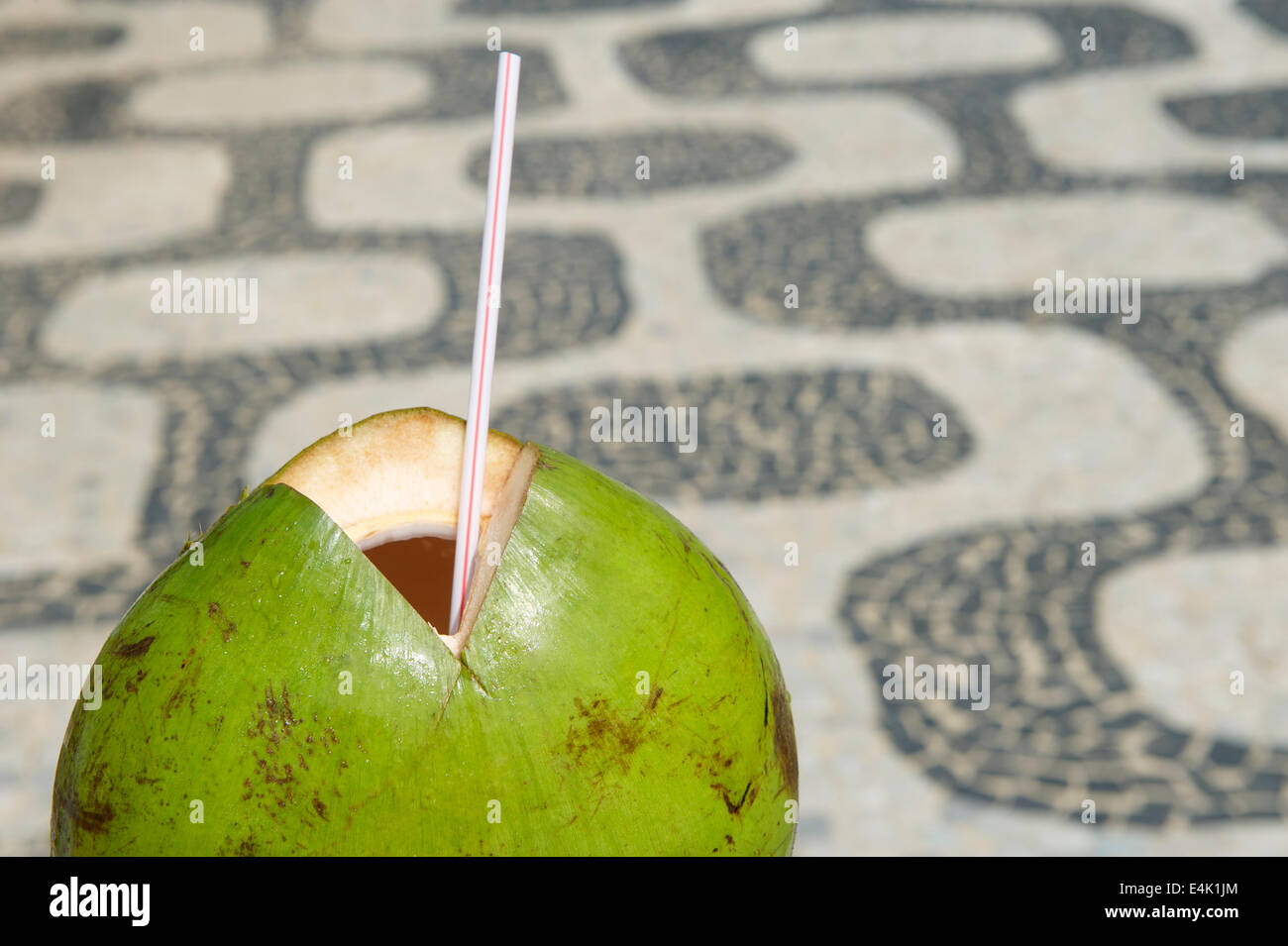 Fresh green Brazilian coco verde drinking coconut at Ipanema Beach ...