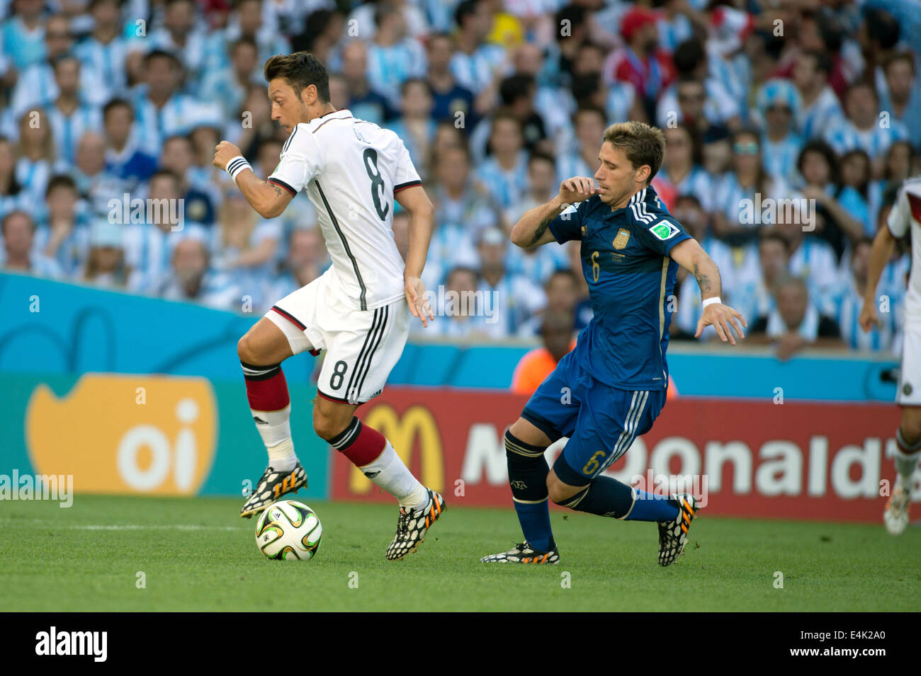 Rio de Janeiro, Brazil. 13th July, 2014. Mesut Ozil (GER), Lucas Biglia ...