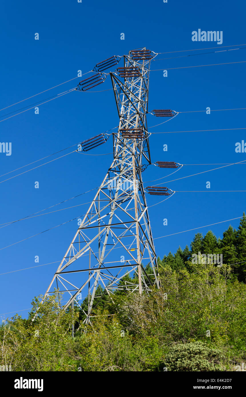 An electrcial transmission tower supports high tension power lines ...