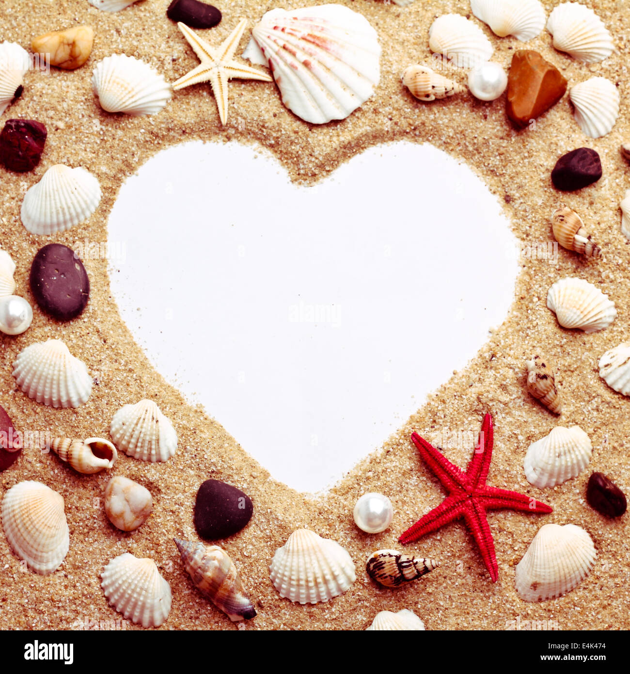 heart made with shells. Heart shape on sand Stock Photo - Alamy