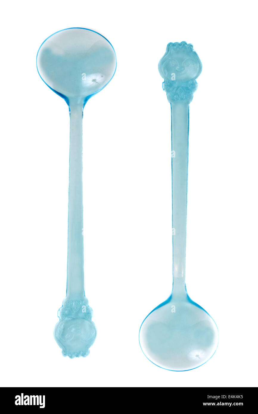 Two blue transparent plastic spoons Stock Photo - Alamy