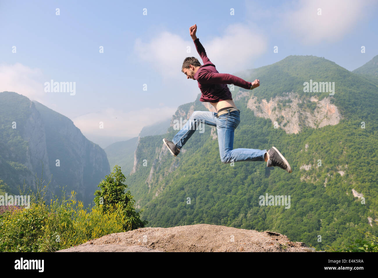 man jump in nature Stock Photo - Alamy