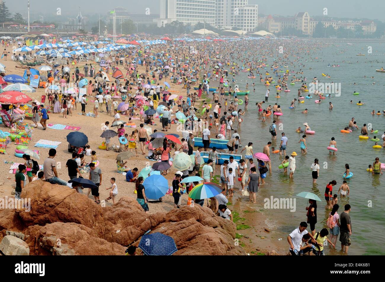 July 13, 2014 - DALIAN, CHINA - JULY 13: A large number of tourists ...