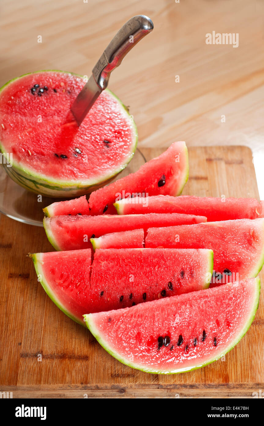 fresh watermelon on a wood table Stock Photo - Alamy