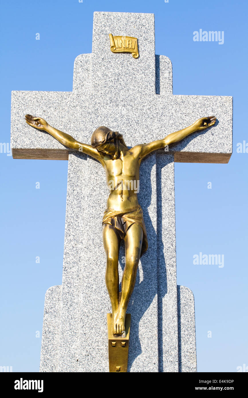 A stone cross in a cemetery Stock Photo - Alamy