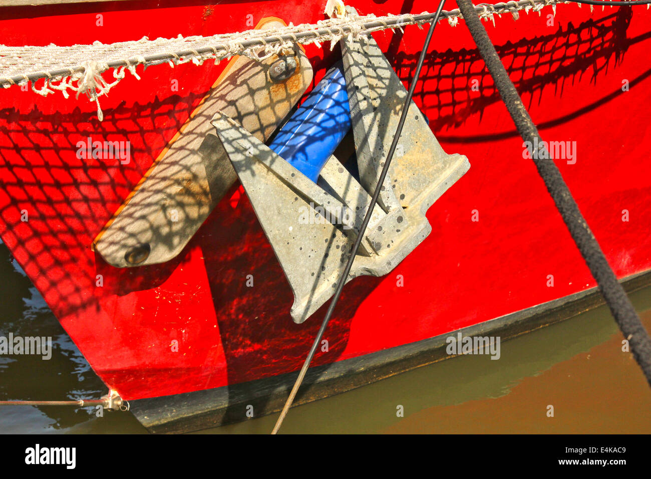 Red boat and anchor Stock Photo - Alamy