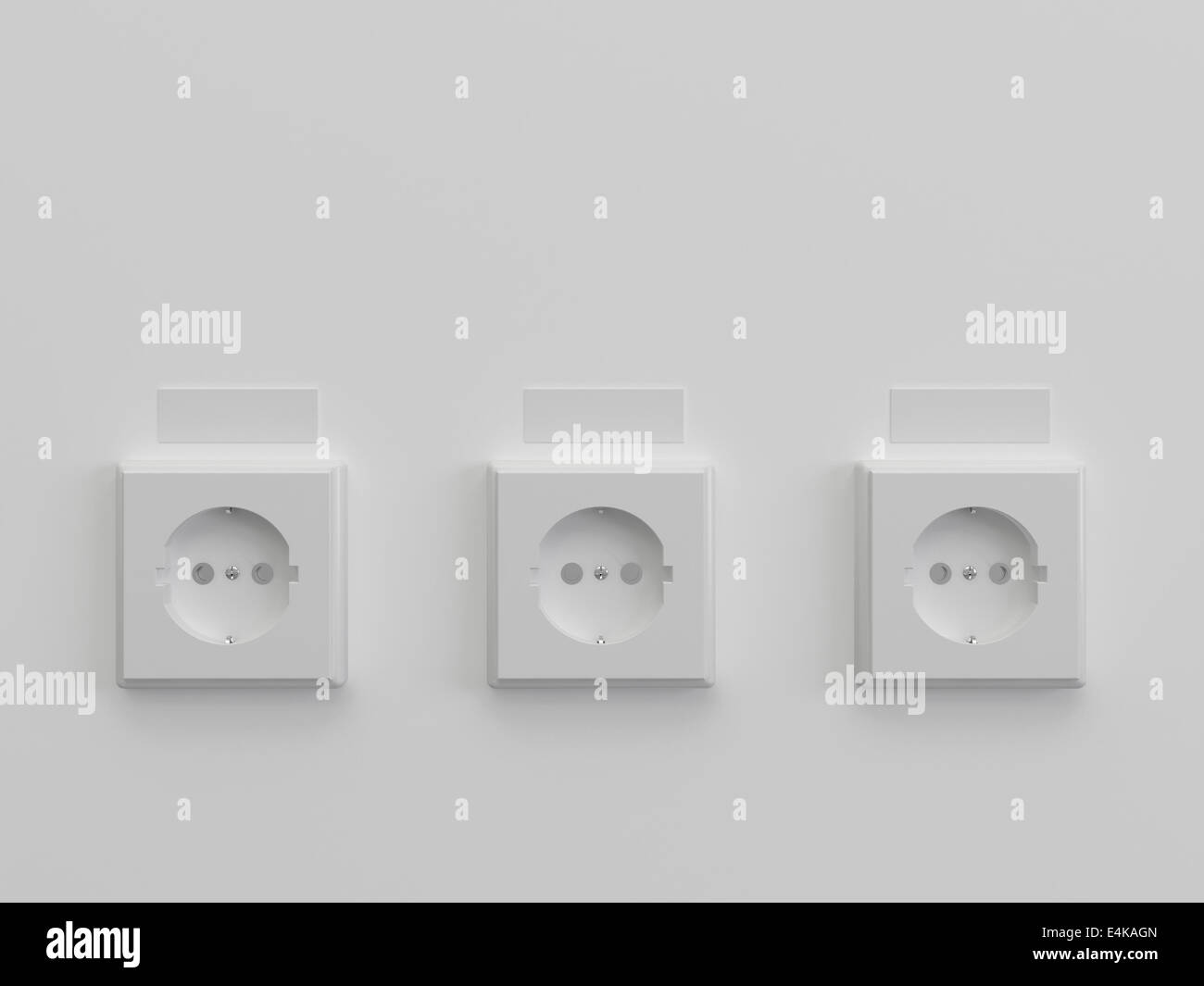 Three white sockets Stock Photo - Alamy
