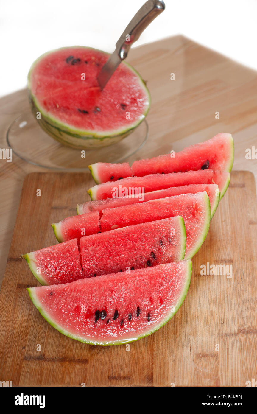 fresh watermelon on a wood table Stock Photo - Alamy