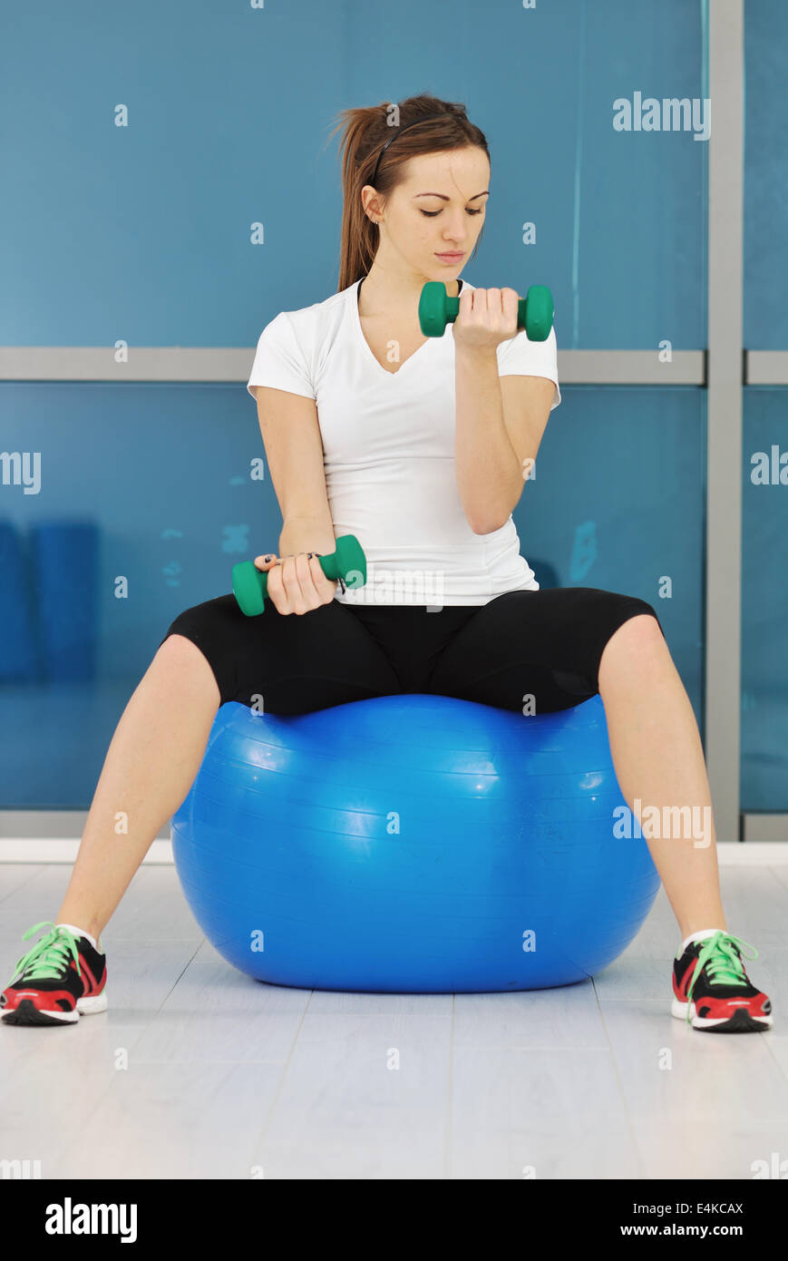 woman fitness workout with weights Stock Photo - Alamy