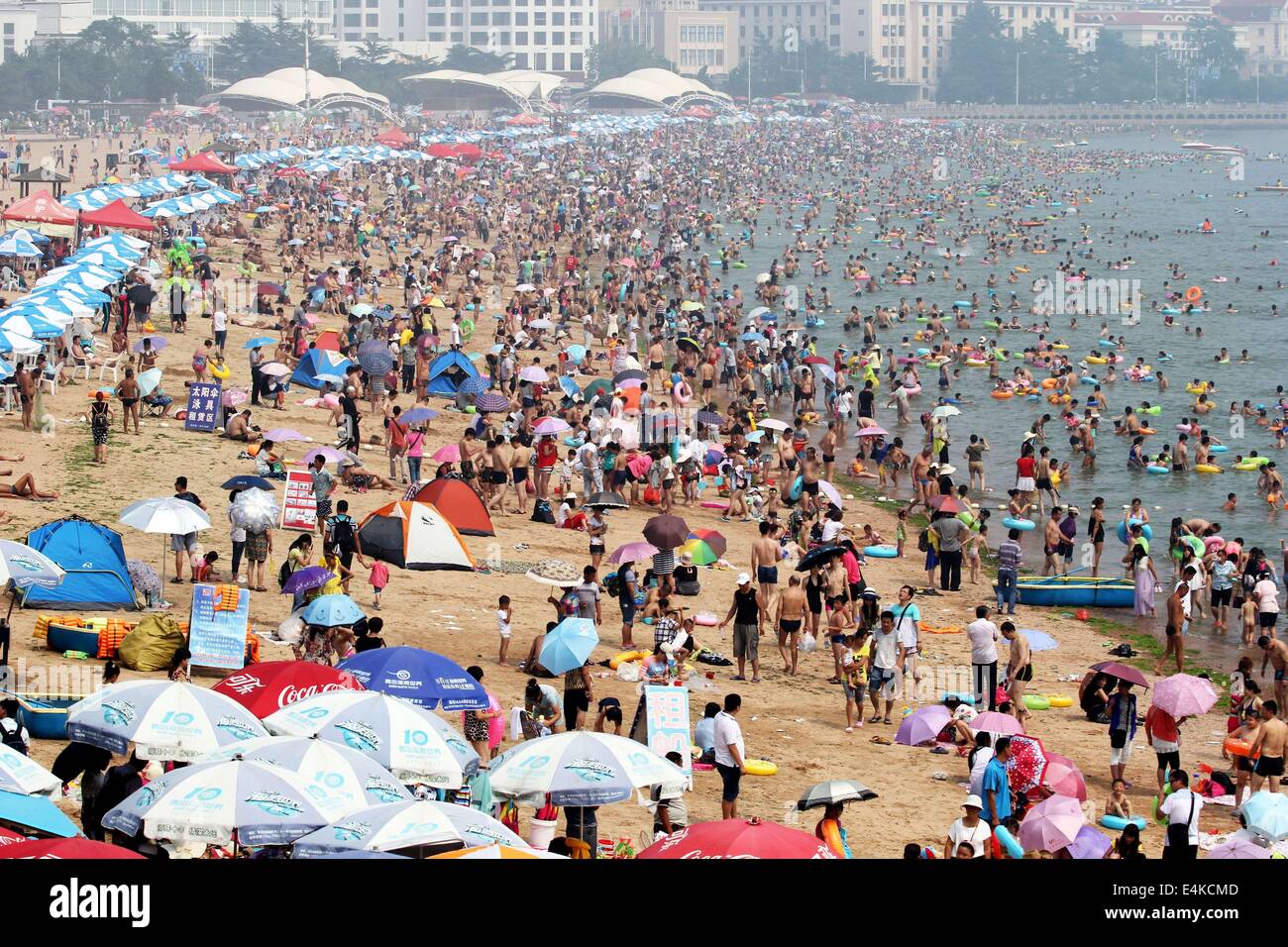 Dalian, China. 13th July, 2014. JULY 13: A large number of tourists ...