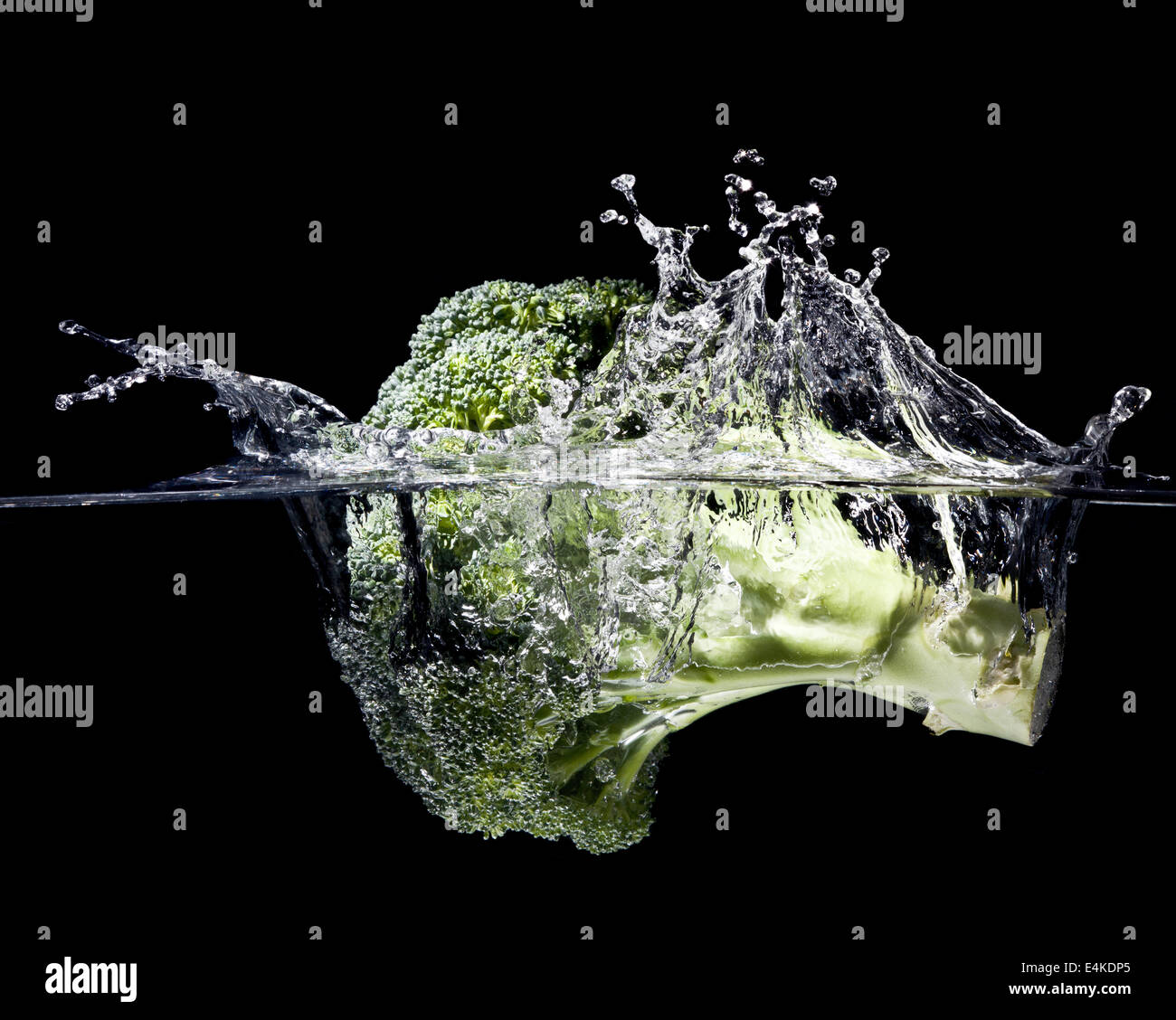 high speed photography broccoli splash in water Stock Photo - Alamy