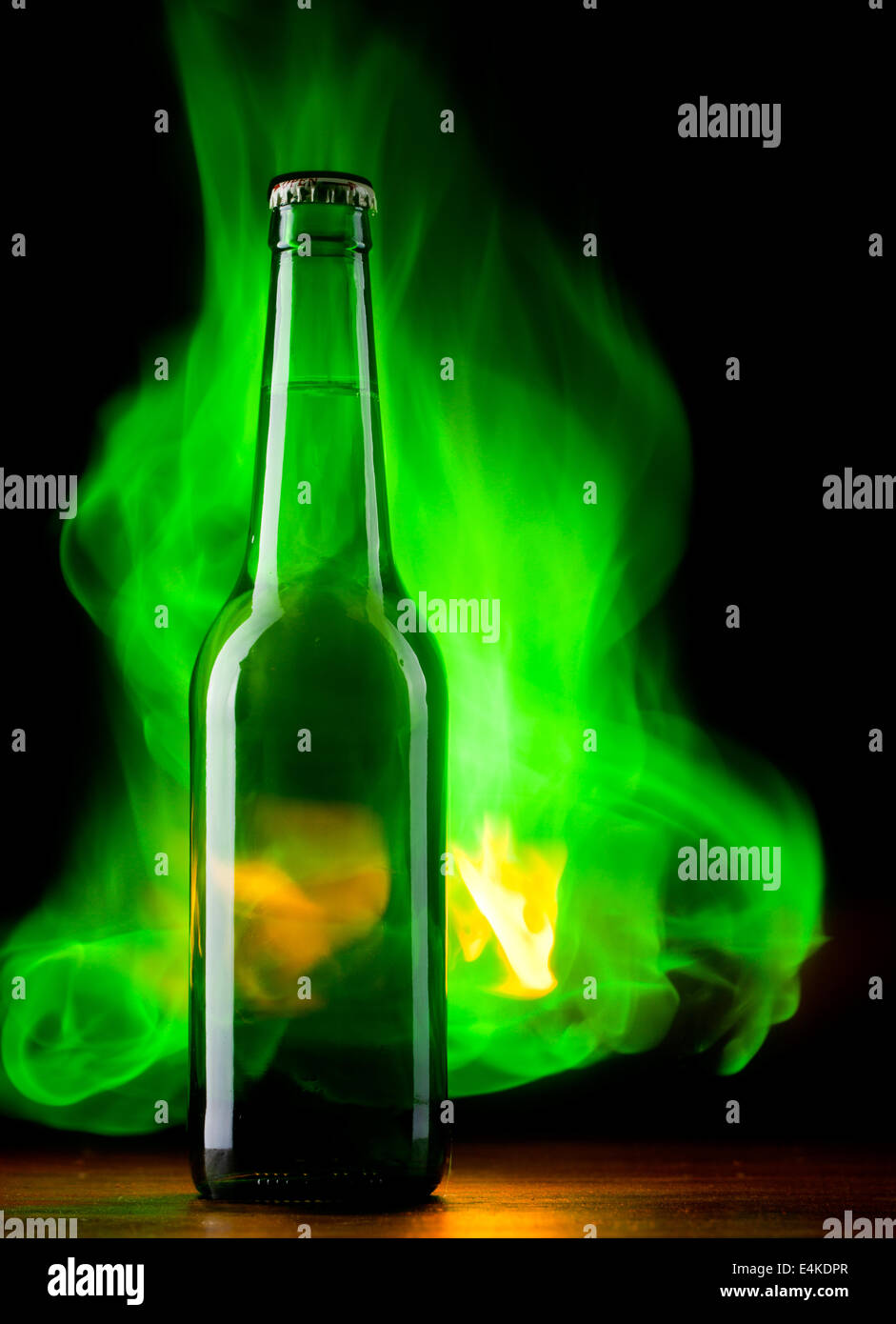 Beer bottle with color fire Stock Photo - Alamy