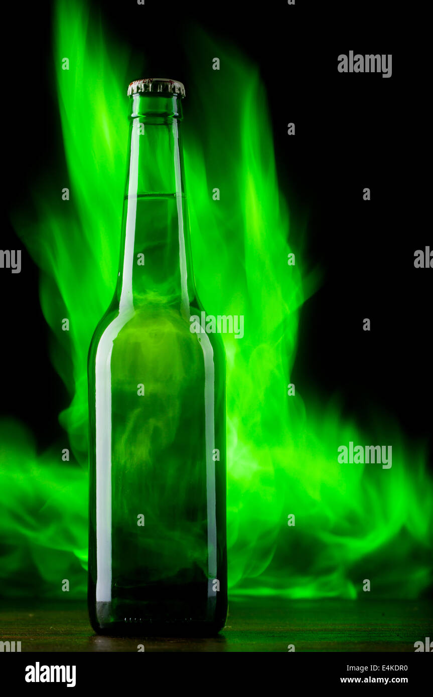Beer bottle with color fire Stock Photo - Alamy