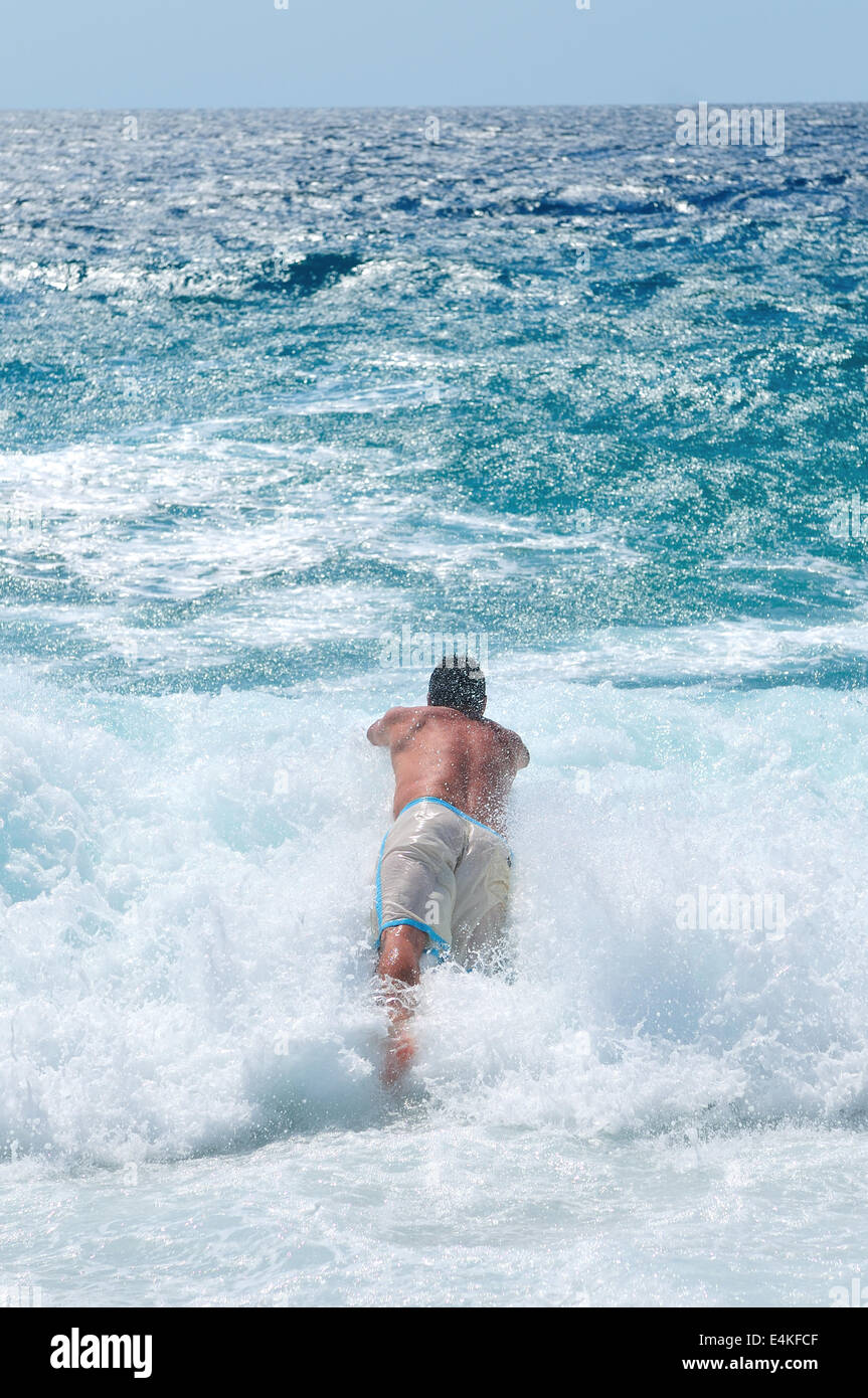 man jumping in sea Stock Photo - Alamy