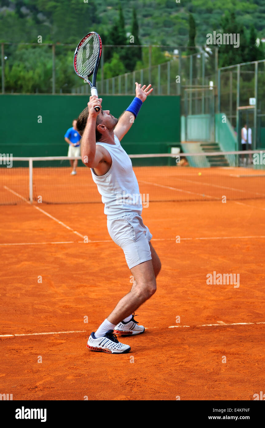 One man play tennis outdoors Stock Photo - Alamy