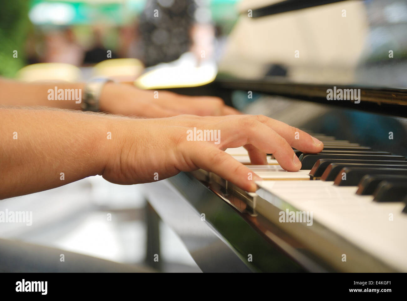 Man playing melody on piano Stock Photo - Alamy