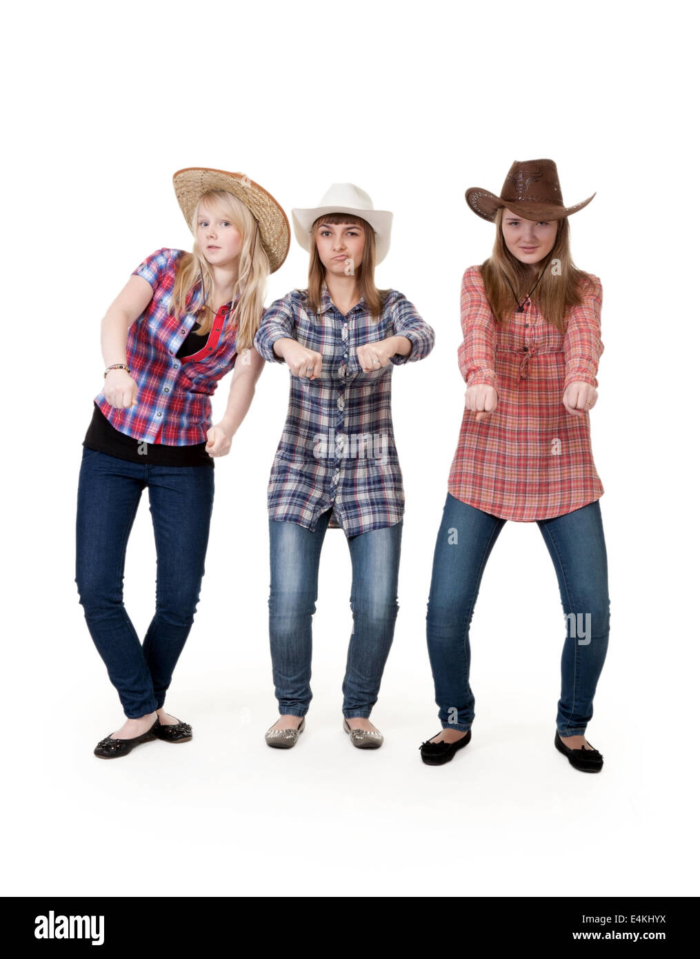 Three girls in hats Stock Photo - Alamy