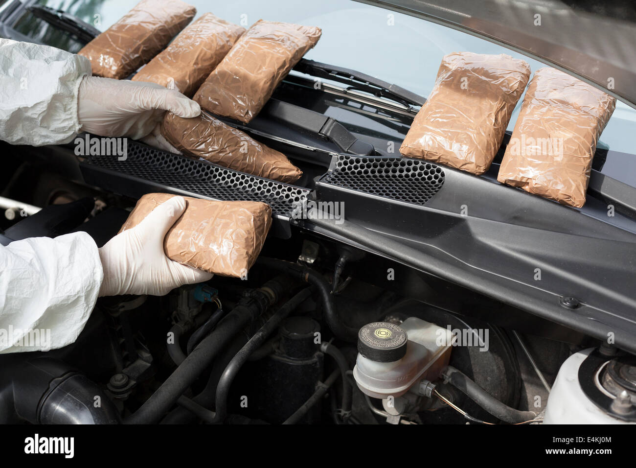 Hidden drugs in a vehicle compartment hi-res stock photography and ...