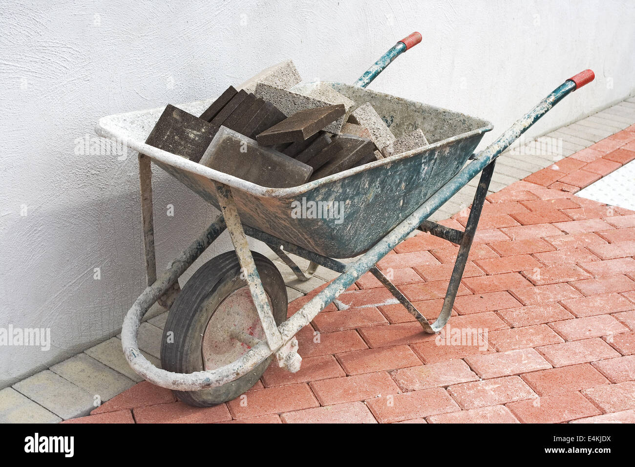 Old full wheelbarrow Stock Photo - Alamy
