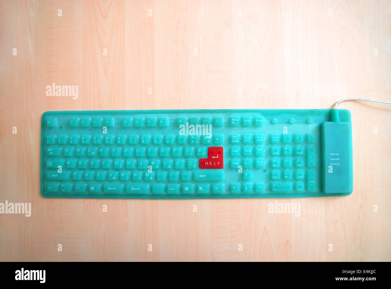 Modern keyboard with help button Stock Photo - Alamy